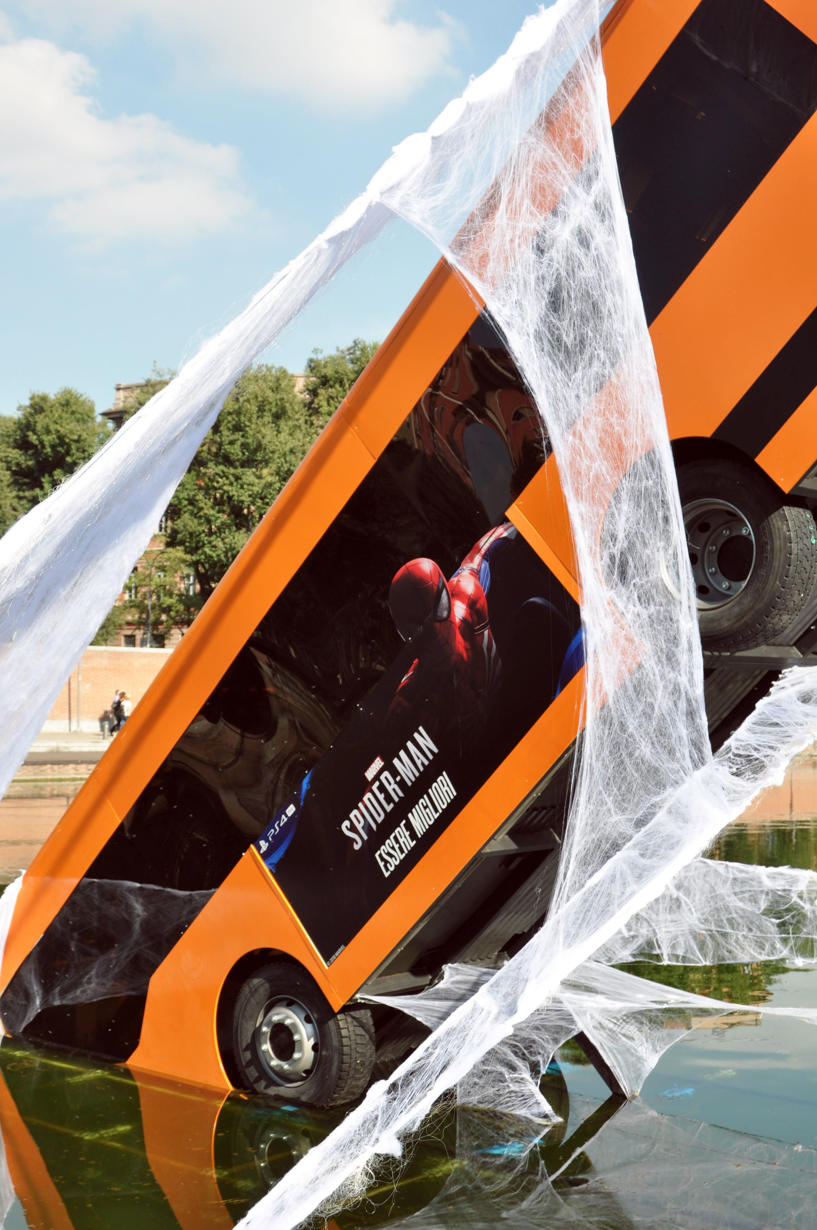 Sony Celebrates Marvel's Spider-Man Release by Throwing Bus Into a Lake ...