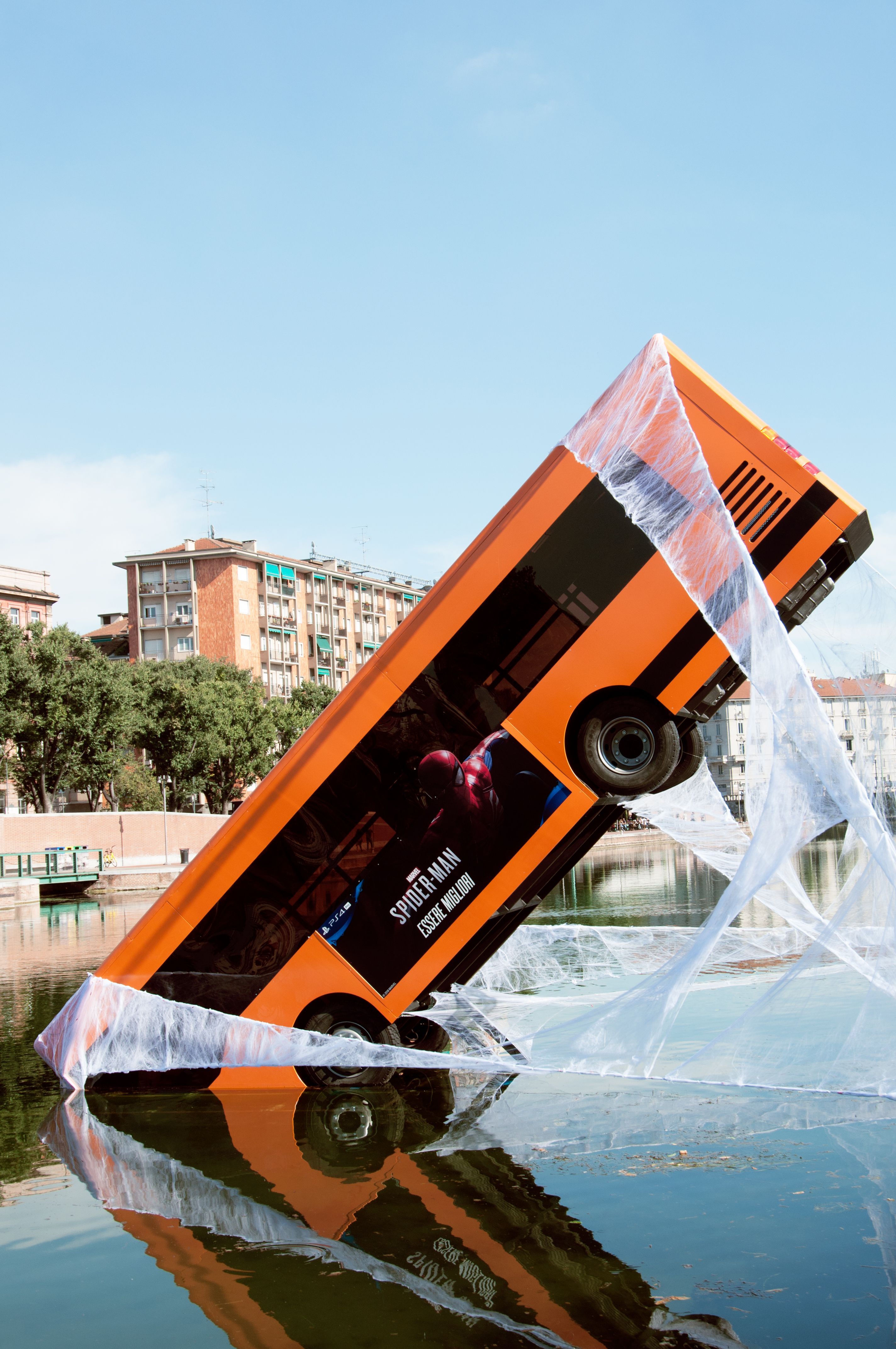 Sony Celebrates Marvel's Spider-Man Release by Throwing Bus Into a Lake ...